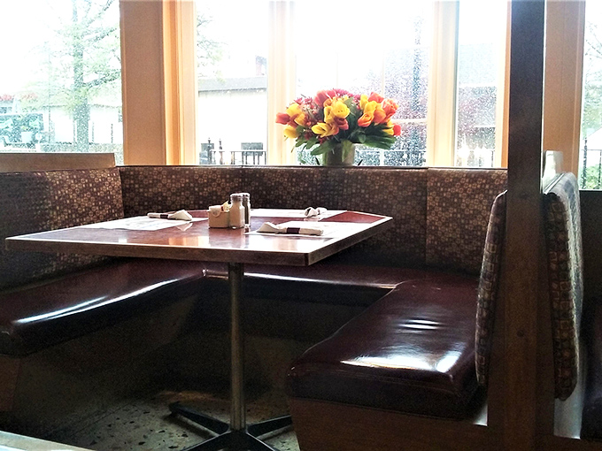 Booth seating with a view&mdash;where countless conversations have unfolded over plates of eggs and endless cups of coffee.