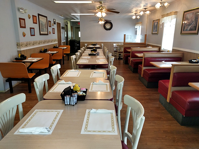 A dining room where every table tells a story, and the red booths have probably heard decades of local gossip.
