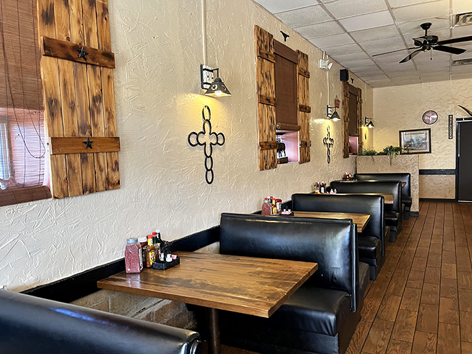 Booth seating that invites you to settle in and stay awhile, with rustic wooden accents that whisper, "Take your time, partner."