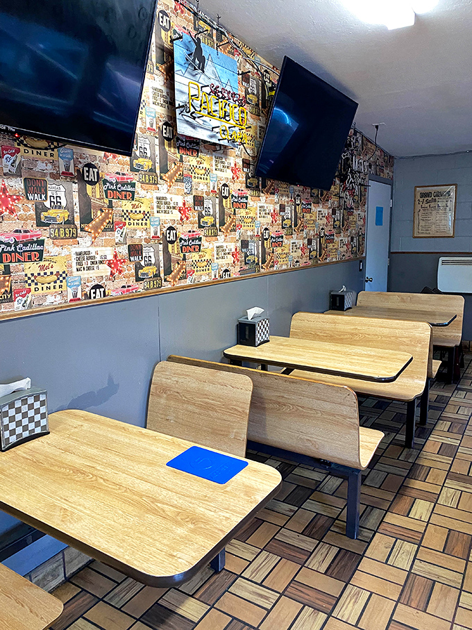 The dining area's collage wall could keep you entertained through several meals. Each table offers front-row seats to decades of American road trip culture.