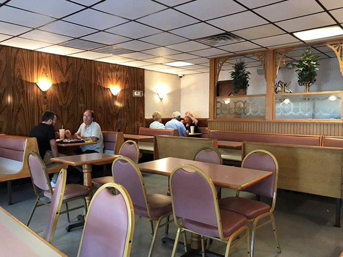 The dining area isn't designed by an award-winning interior decorator, but by decades of satisfied customers who wouldn't change a single wood panel.