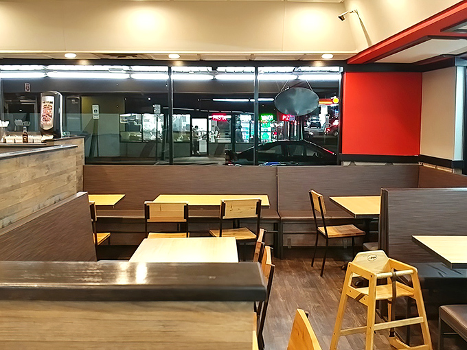 Simple wooden tables and chairs say, "Sit down, stay awhile." No pretension here&mdash;just a place where food takes center stage.