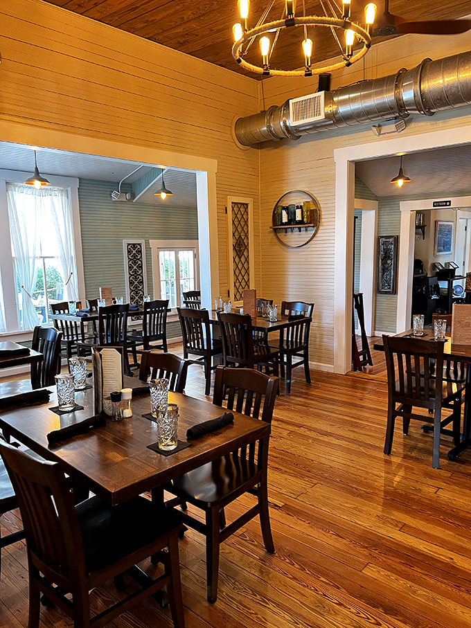The dining room strikes that perfect balance between "nice enough for a special occasion" and "comfortable enough to linger." Those wooden floors have witnessed countless happy food comas.
