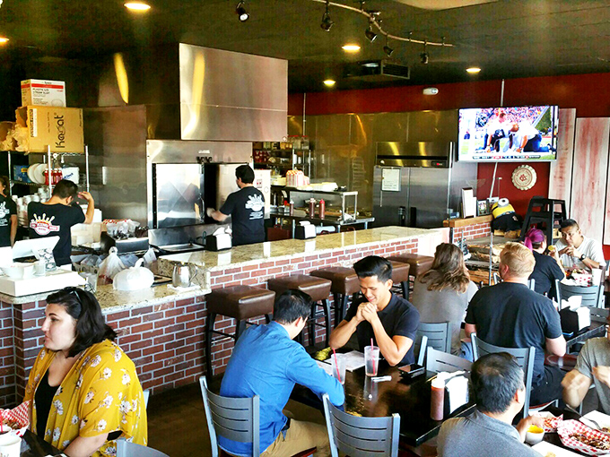 Where barbecue dreams come true while sports play on the screens. The half-filled dining room isn't a statement on quality&mdash;it's just evidence you've beaten the rush.