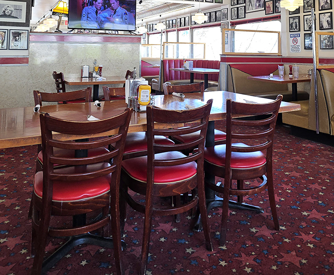 The dining area where strangers become temporary family, united by the universal language of "pass the syrup, please."