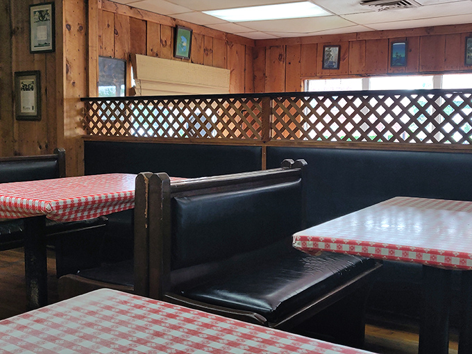 Navy blue booths and lattice dividers create the perfect sandwich sanctuary. No distractions from the serious business of enjoying your meal.