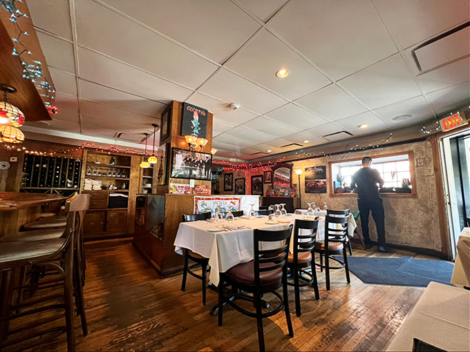 A dining room where memories are made between bites. Notice how the white tablecloths elevate everything, including your mood.