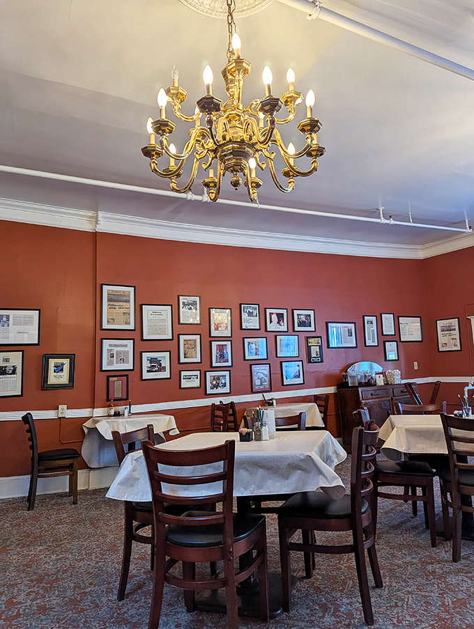 Elegant chandeliers hanging over tables where deals are made, anniversaries celebrated, and Southern cuisine properly revered.