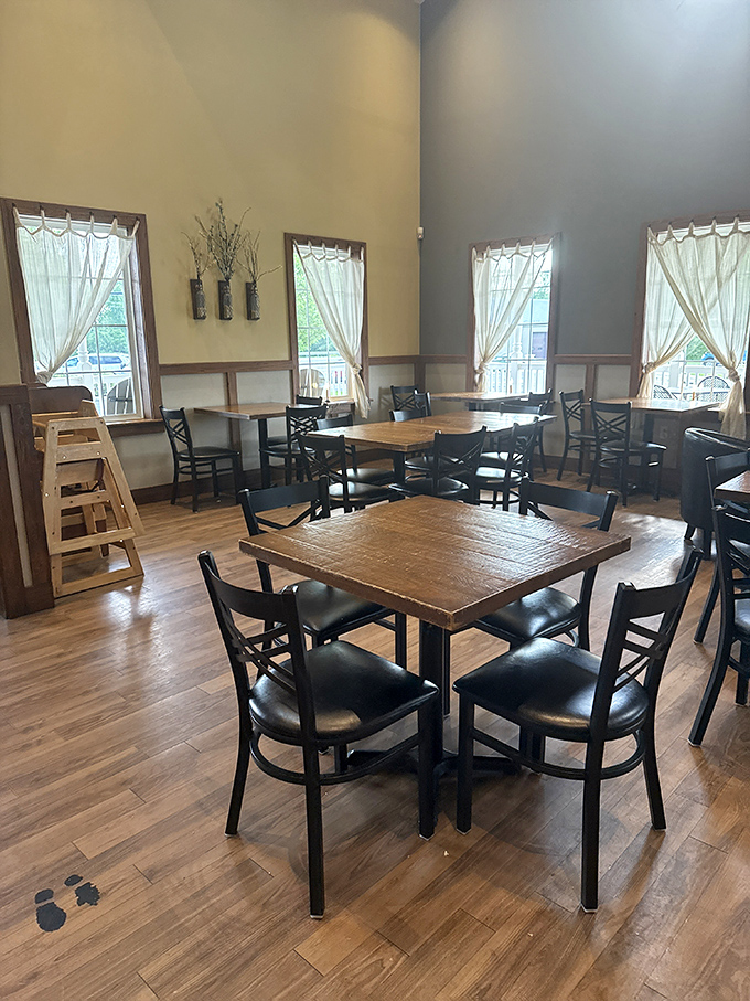 The dining area feels like the farmhouse living room you wish you had. Those wooden tables have witnessed countless ice cream epiphanies.