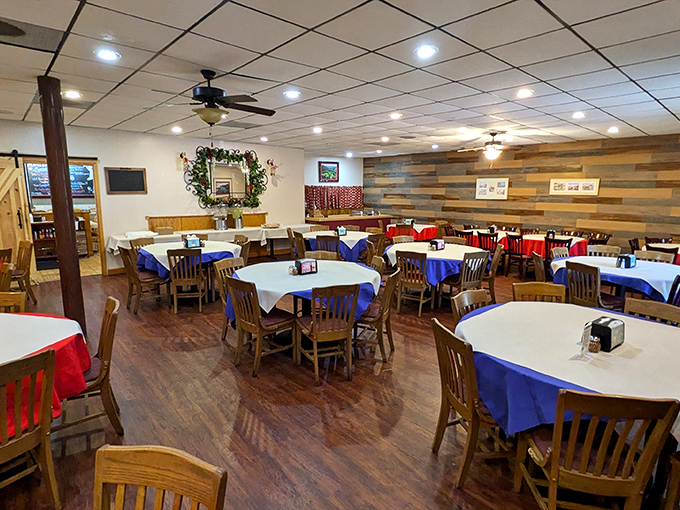 The dining room's red and blue tablecloths against wooden accents create that perfect "special but comfortable" atmosphere for family gatherings.