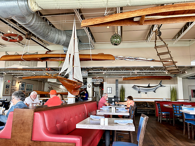 Boats hanging from the ceiling, natural light flooding in, and not a bad seat in the house&mdash;this is dining room perfection.