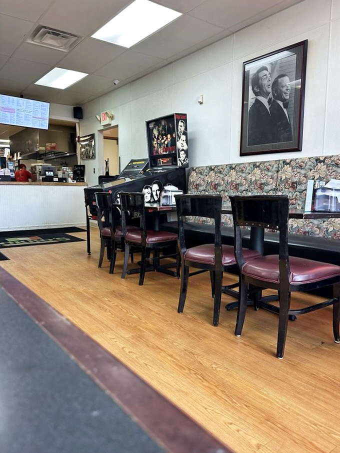 The dining area's vintage photographs and simple furnishings create that perfect "been here forever" vibe that makes neighborhood institutions feel like home.