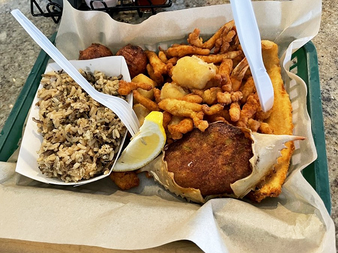A seafood symphony on paper. This platter hits all the right notes with its perfectly fried medley and side of wild rice.