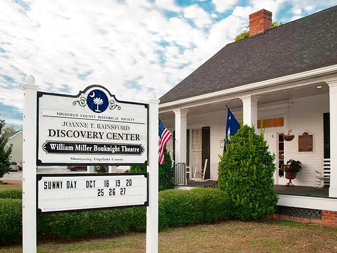 The Discovery Center's welcoming porch and informative signage invite visitors to uncover Edgefield's stories in air-conditioned comfort.