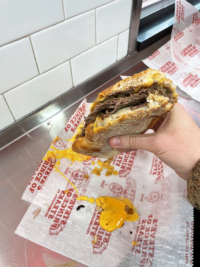 The double meat cheesesteak doesn't just break the rules of sandwich physics—it rewrites them entirely. More isn't just more, it's magnificent.