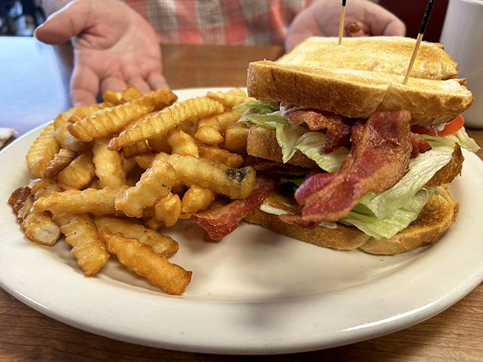 The BLT, elevated to skyscraper status. A sandwich architecture so perfect it should require building permits.