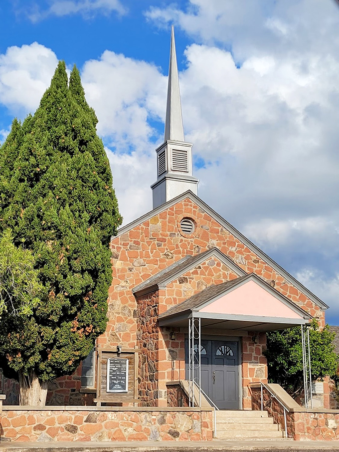 Faith with a view! This charming stone church stands sentinel against the mountains, its steeple reaching toward those famous West Texas skies.