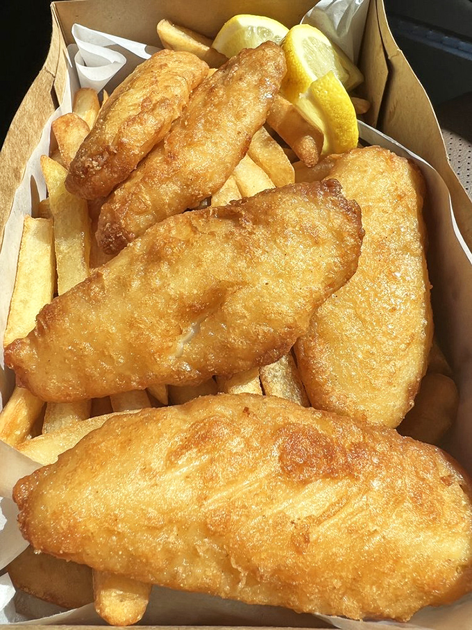 Fish and chips golden enough to make the California sun jealous, with a lemon wedge standing by for that perfect citrus kick.