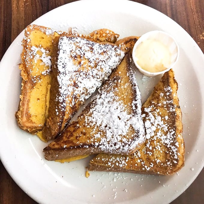 French toast that makes you question why you ever bothered with cereal. That dusting of powdered sugar? The morning equivalent of fairy dust.