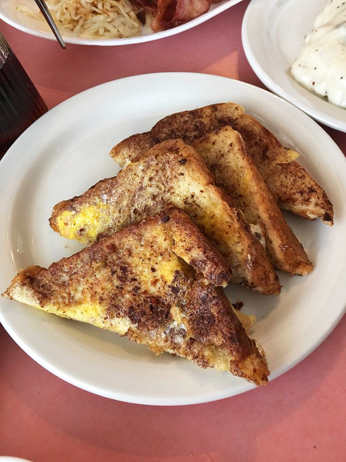 French toast so perfectly golden, it makes you wonder if the cook has some sort of pact with the breakfast gods.