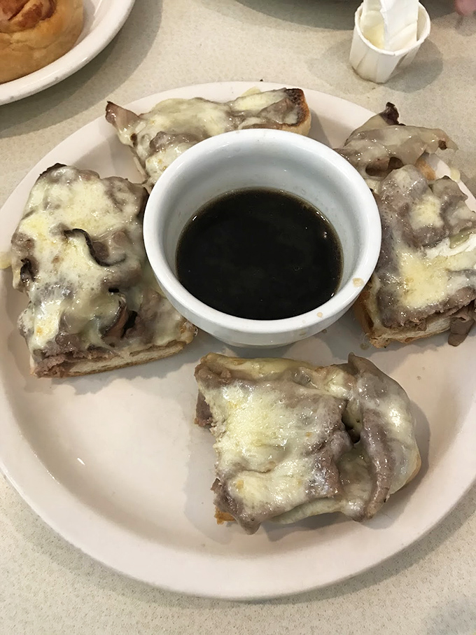 These open-faced sandwiches with melted cheese and au jus aren't just food&mdash;they're a warm hug on a plate.