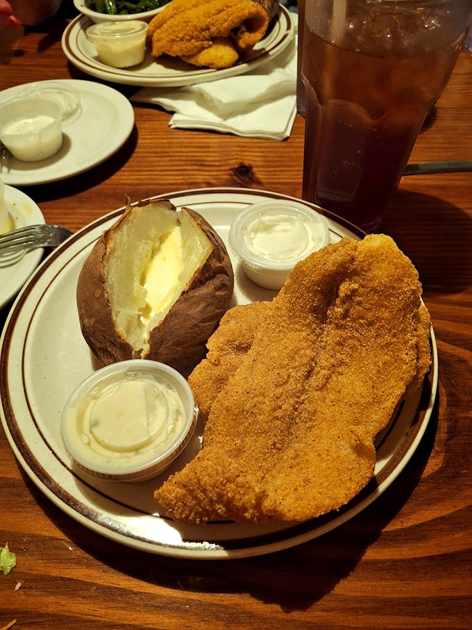 Fried catfish so perfectly golden it looks like it jumped straight from Southern waters onto your plate.