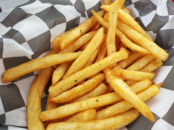 These aren't just fries; they're golden wands of potato perfection, seasoned with what can only be described as delicious wizardry.