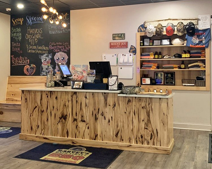 A counter crafted from wood with character lines deeper than Robert Redford's. The chalkboard menu promises daily specials worth breaking your diet for.