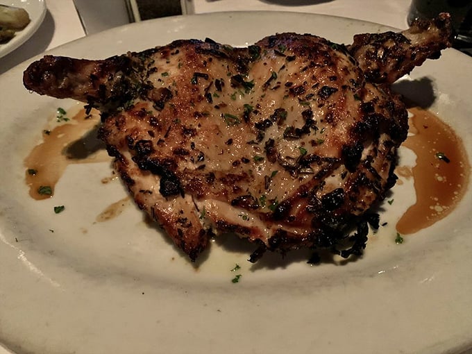 The Garlic Chicken proves that even poultry gets the royal treatment here, glistening with herbs and juices that demand to be sopped up.