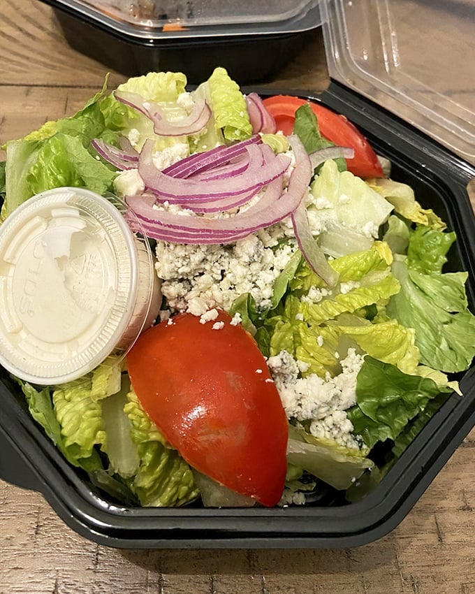 A house salad that knows its role &ndash; fresh, crisp, and ready to prepare your palate for the main event without stealing the spotlight.