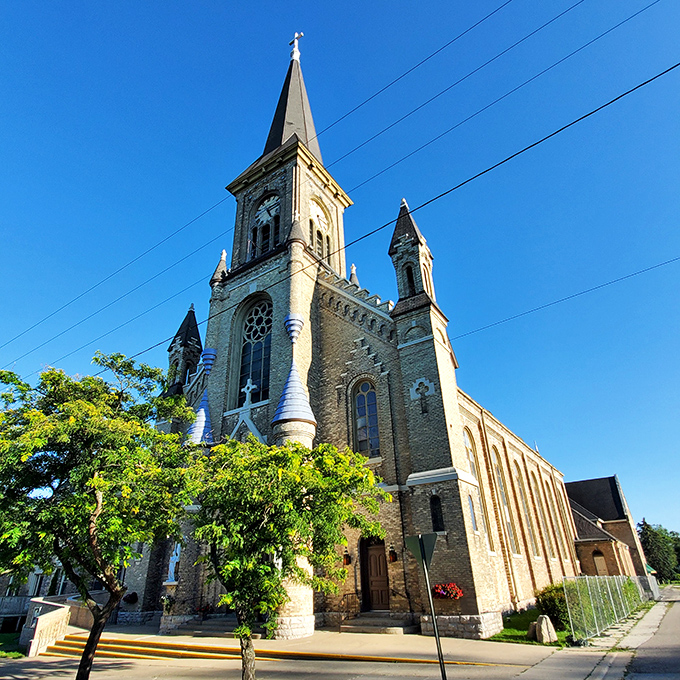 Guardian Angel Catholic Church reaches skyward with twin spires that make even atheists appreciate good craftsmanship.