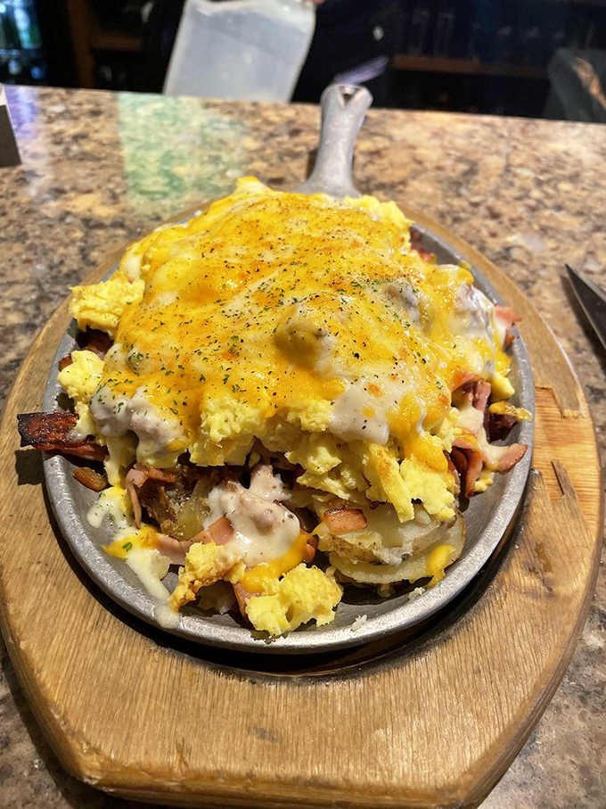 The "Hangover Skillet" &ndash; where breakfast meets therapy, piled high with eggs, potatoes, cheese, and enough protein to resurrect you from yesterday's poor decisions.