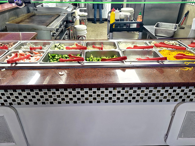 The hibachi station&mdash;where vegetables become supporting actors in your personalized protein drama.