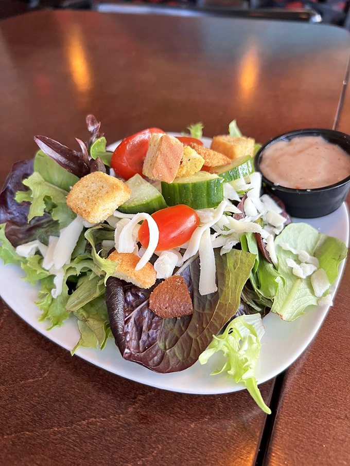 A house salad that proves even the simplest dishes can be extraordinary when made with genuine care.