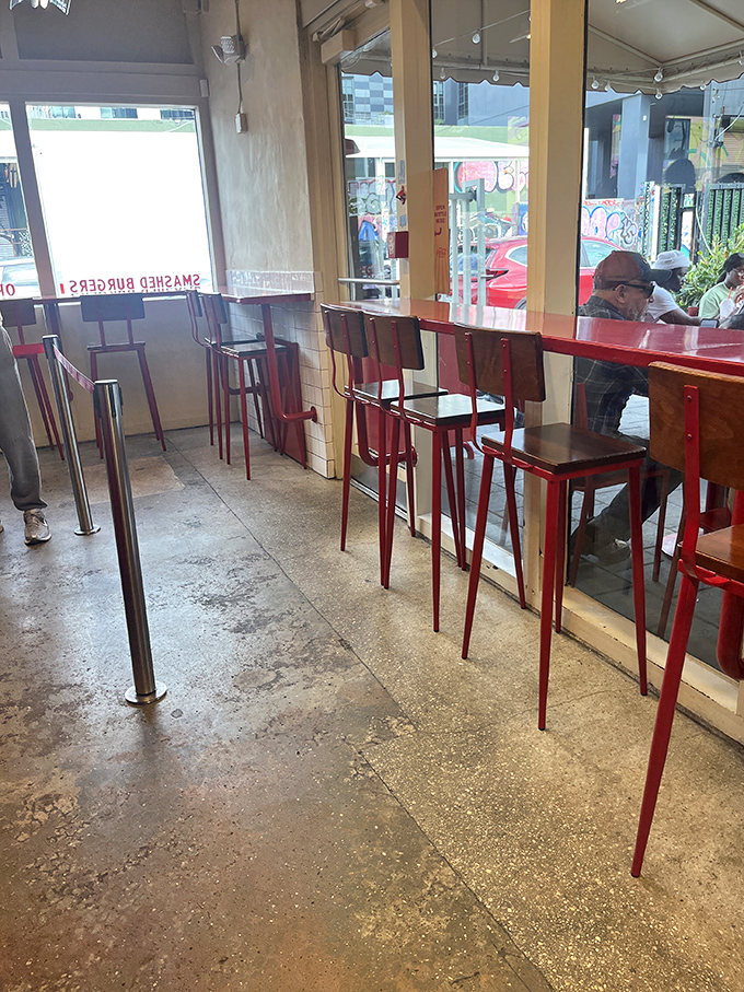 Those signature red chairs invite you to stay awhile. The minimalist interior says, "We're focused on the food, not fancy decorations."