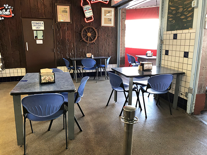 The indoor dining area keeps it simple with blue chairs and nautical touches. This isn't a place that needs mood lighting &ndash; the food creates the atmosphere.