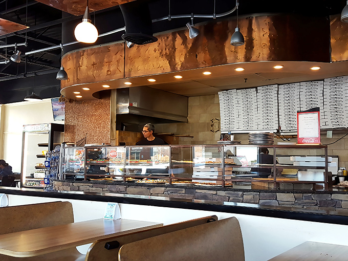 The open kitchen concept isn't just trendy&mdash;it's a stage where pizza-making becomes performance art worth the price of admission.