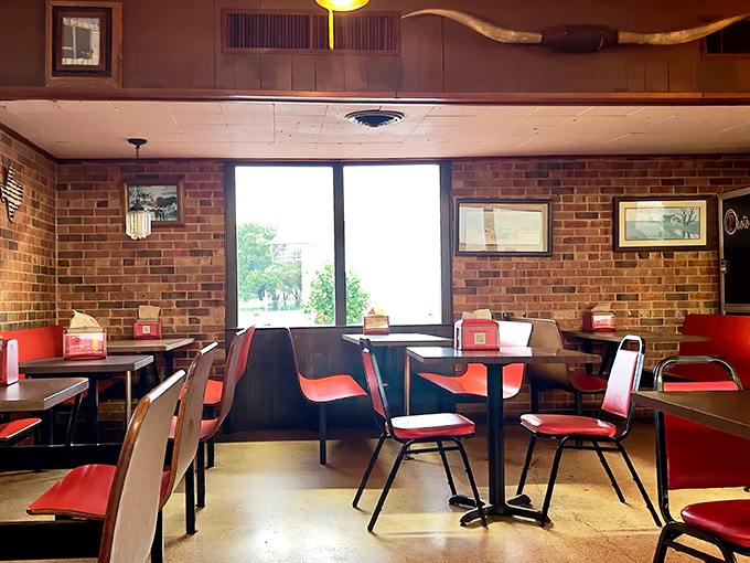 Brick walls, ceiling fans, and those red chairs&mdash;the dining room feels like it's been waiting for you to discover it since forever ago. 