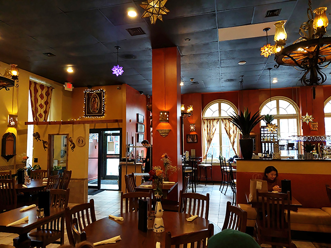 The dining room's architectural details and warm lighting create that "I've discovered somewhere special" feeling that makes you reluctant to tell too many friends.