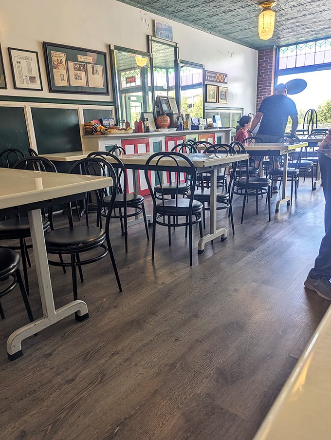 Simple tables, classic chairs, and sandwich perfection. This dining room isn't about the frills&mdash;it's about creating the stage for your taste buds' standing ovation.