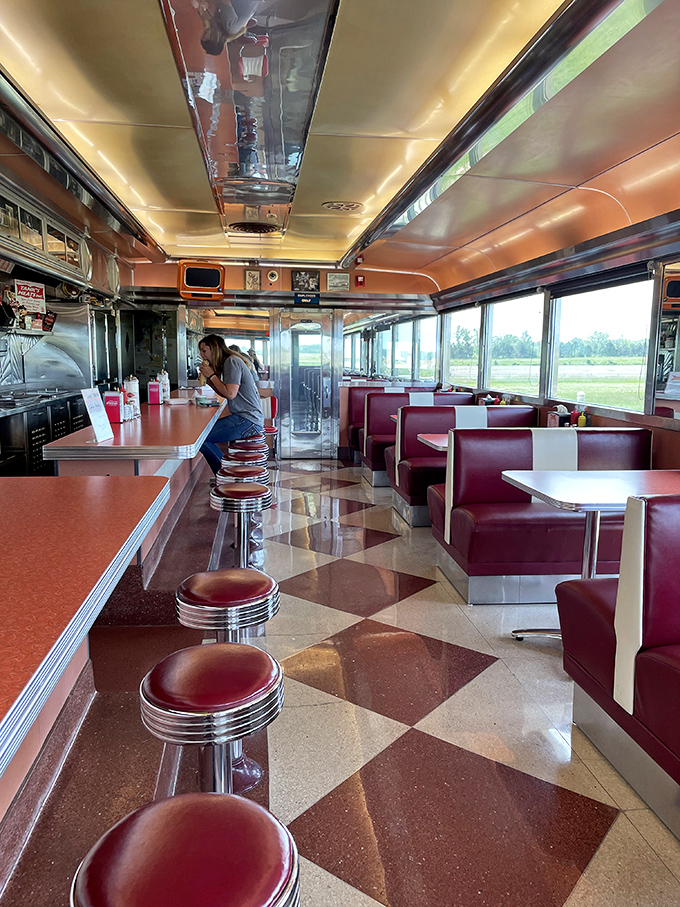 Counter seating with a view of the kitchen&mdash;dinner and a show! The gleaming interior makes airplane cabins look downright cramped.