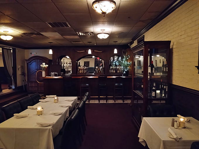 The dining room whispers "special occasion" without shouting "pretentious." Notice how everyone looks 10% more attractive in this lighting?