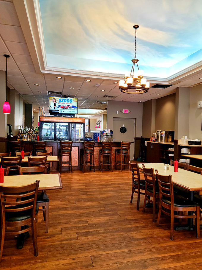 The bar area offers a glimpse into local Cambridge life, where regulars and visitors alike find common ground over good drinks and better conversation.