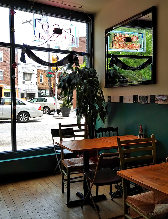 The front window seat offers prime people-watching with your pie. East Passyunk Avenue becomes your dining entertainment.