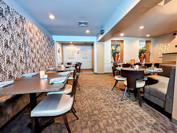 The dining room whispers "special occasion" without shouting it, where every table feels like the best seat in the house.