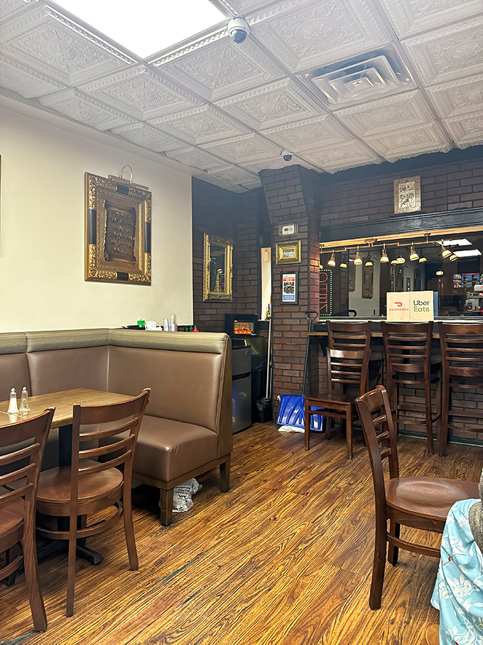 Cozy booths and warm wood tones create that rare restaurant alchemy: a place that feels both established and welcoming.