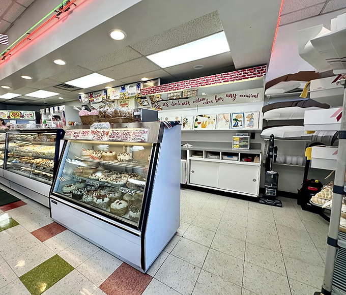 The display case gleams like a jewelry store, except these gems are edible. The red, white, and green color scheme subtly reminds you of the Italian craftsmanship behind each treat..