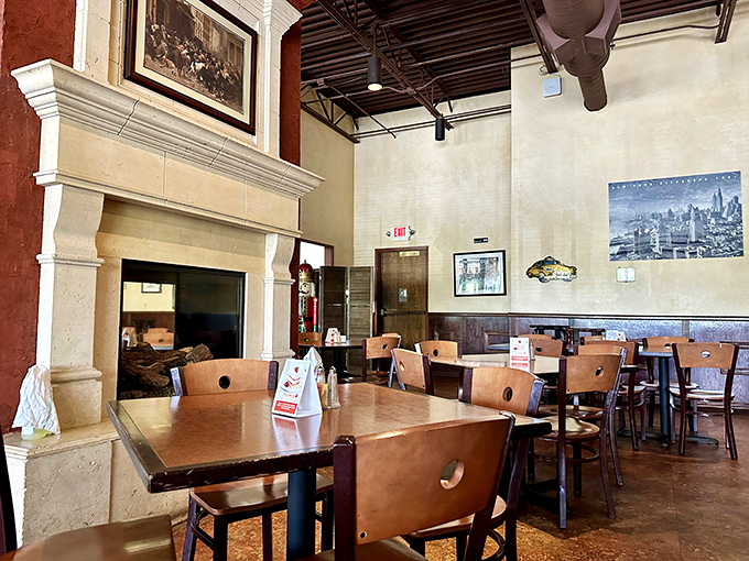 The stone fireplace and wooden tables create an atmosphere that's equal parts rustic tavern and comfortable dining room.