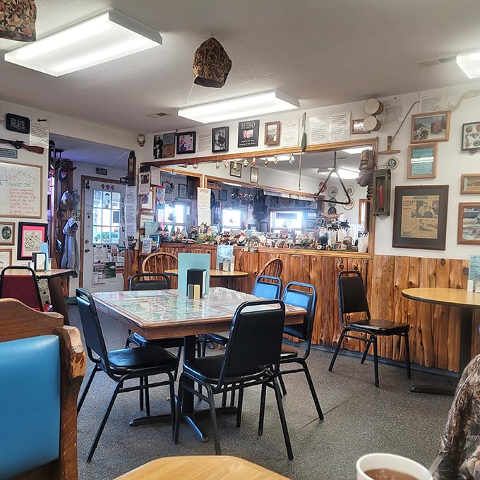 The dining area feels like someone's cherished living room, with wood paneling and tables that have hosted countless conversations and memorable meals.