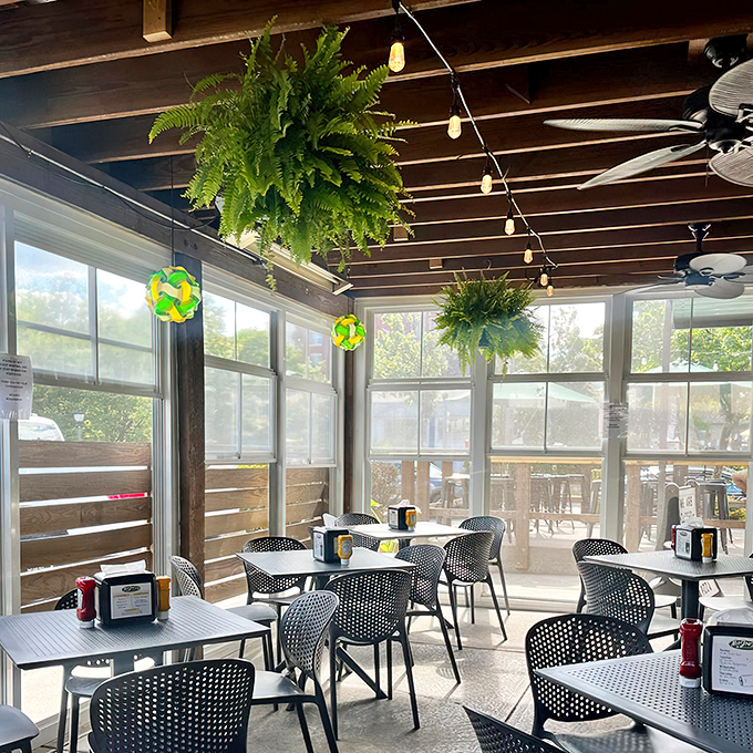 The bar area hums with conversation and anticipation. Those ceiling fans aren't just for show&mdash;they're wafting burger aromas throughout the joint.